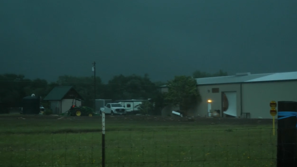 Inside the Storm: Weak tornado with strong winds causes damage near ...